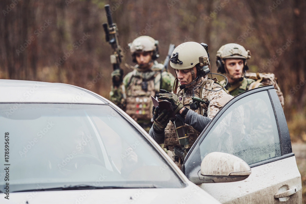 soldiers at the checkpoint stopped a car to check documents Stock Photo ...