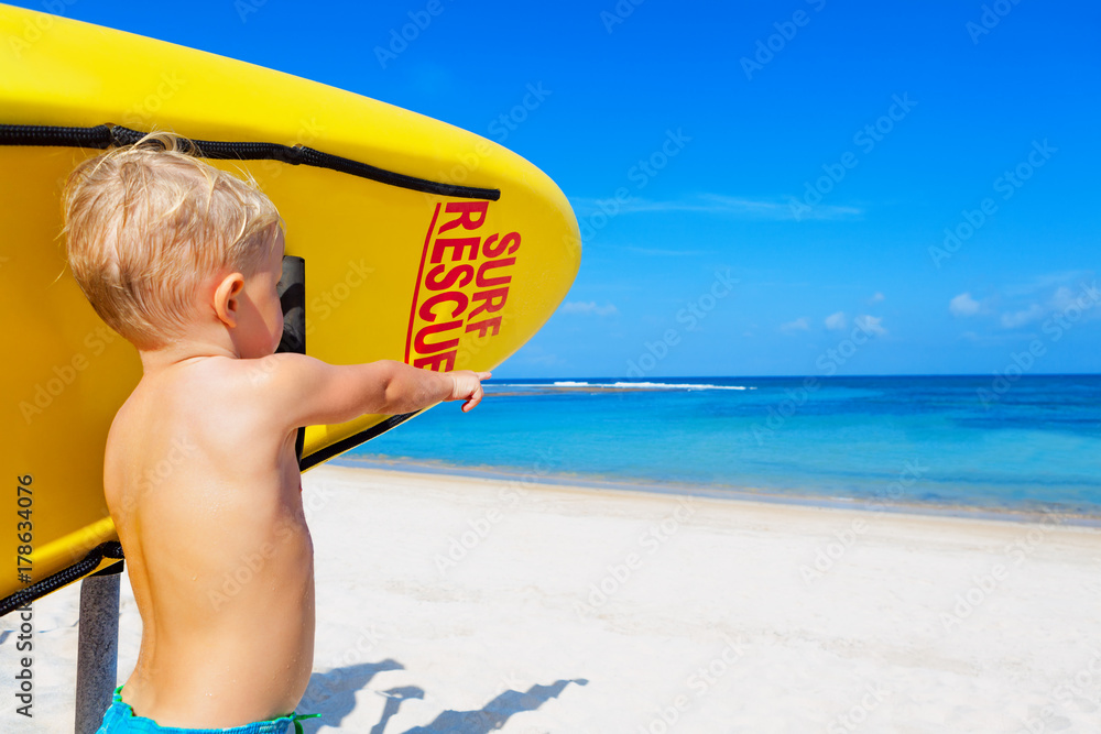 Life saving yellow board with surf rescue sign. Funny children ...