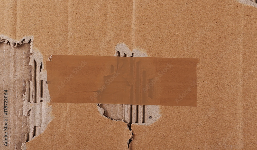 Torn Cardboard with duct, repair tape background and texture Stock ...