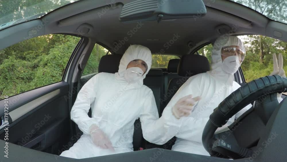 Crazy biohazard scientists technicians in hazmat suits dancing and ...