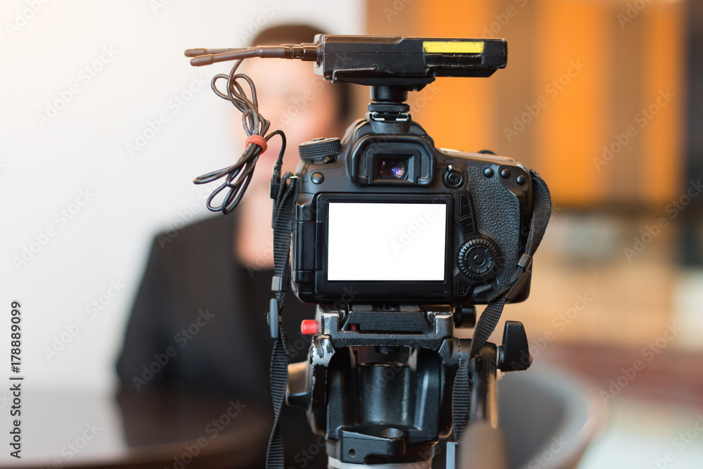 Blur of Video camera or camcorder operator working for record couple ...