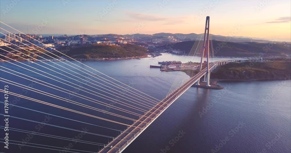 Flying backwards above the Russian Bridge, the world's longest cable ...