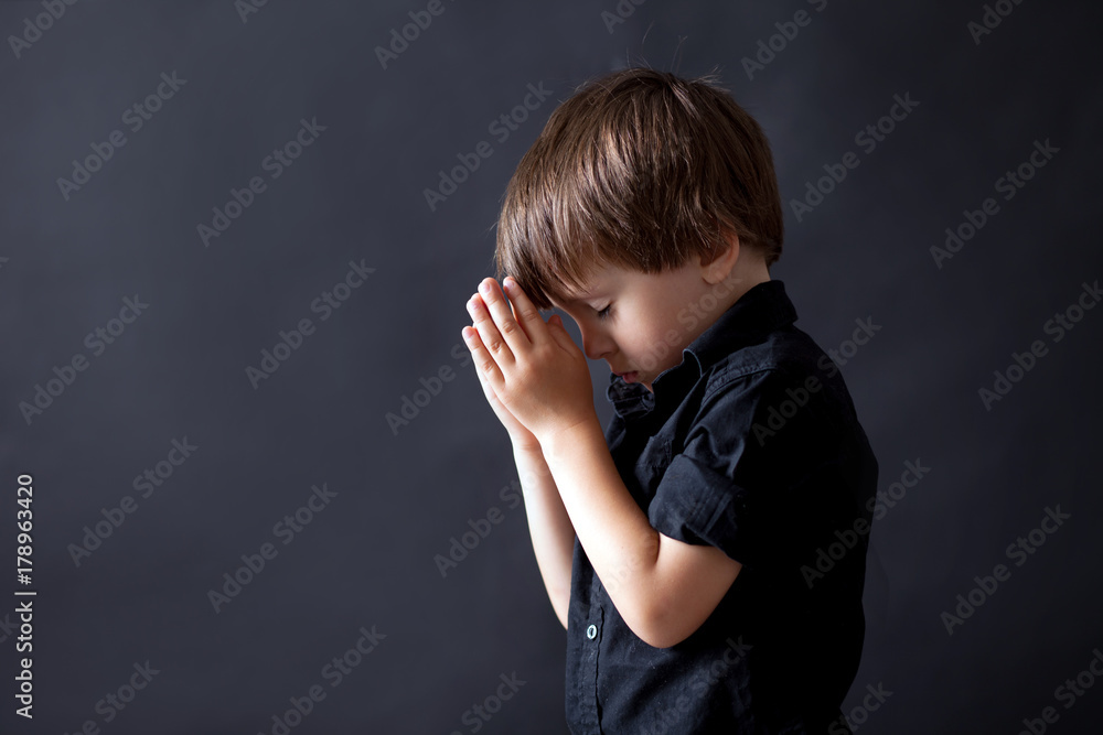 Little boy praying, child praying, isolated background Stock Photo ...