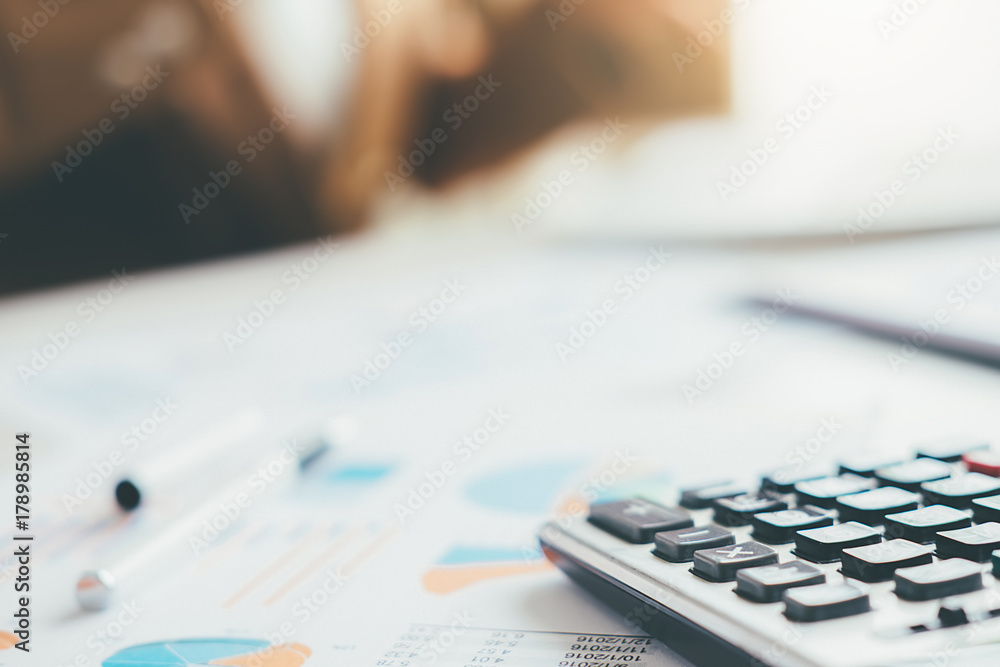 Woman with bills and calculator. Woman using calculator to calculate ...