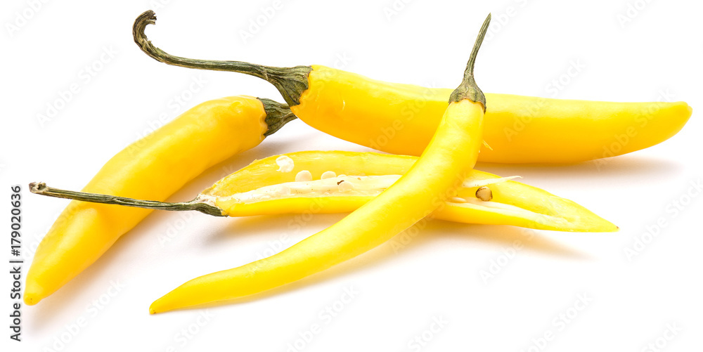Yellow Chili peppers, two whole and one sliced, two halves, isolated on ...