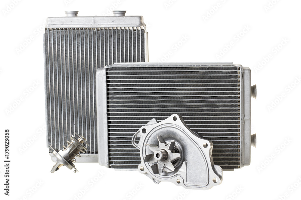 Engine cooling radiators. Water pump and thermostat, two elements of ...