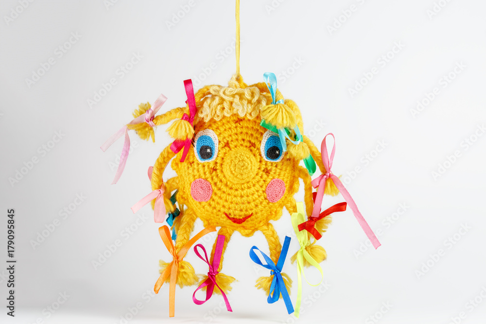 Foto Stock The sun toy made of wool | Adobe Stock