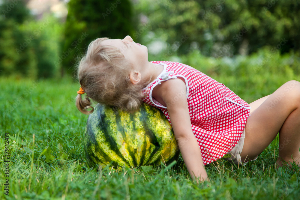 Funny little girl with watermelon slice Stock Photo | Adobe Stock