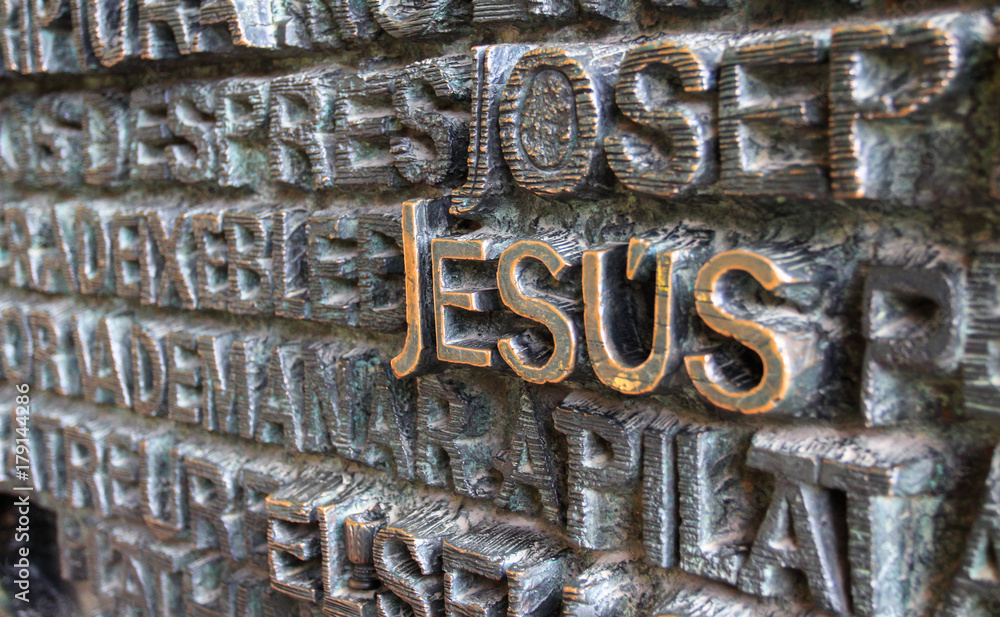 The inscription JESUS on the door of Antoni Gaudi's Sagrada Familia ...