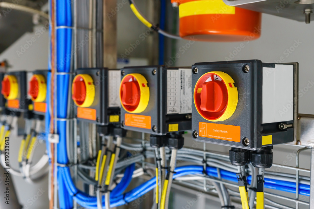 Electrical panel at a assembly line factory. Controls and switches ...