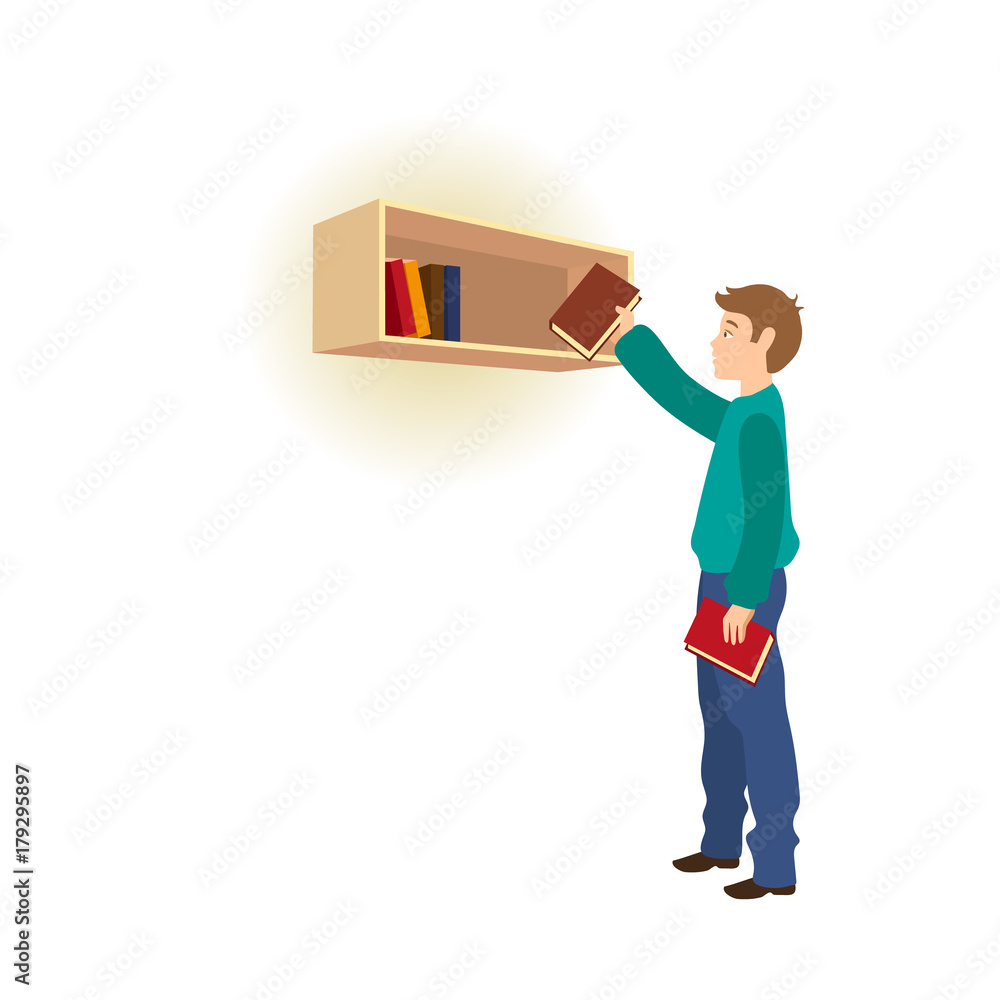 Young man taking, picking a book from bookshelf, shelf in library ...