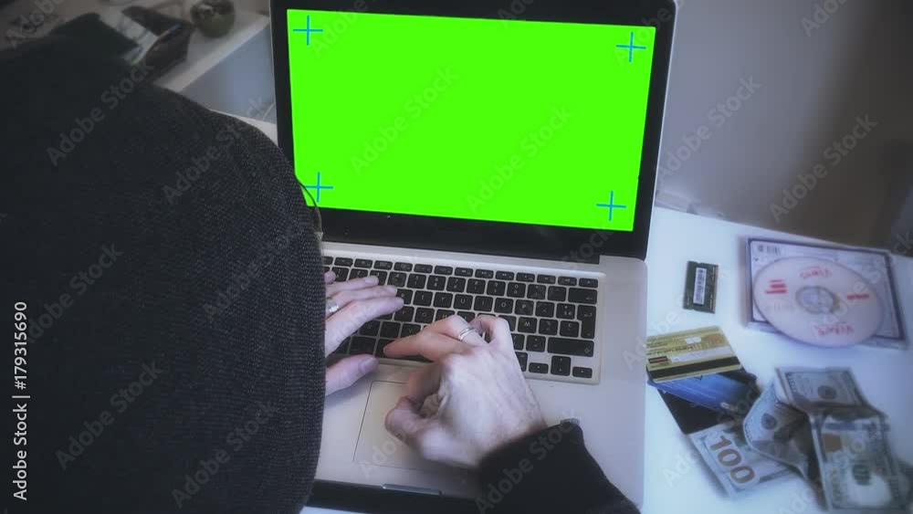 Zoom In Anonymous Hacker, Cyber Attack Green Screen Laptop. Hooded ...