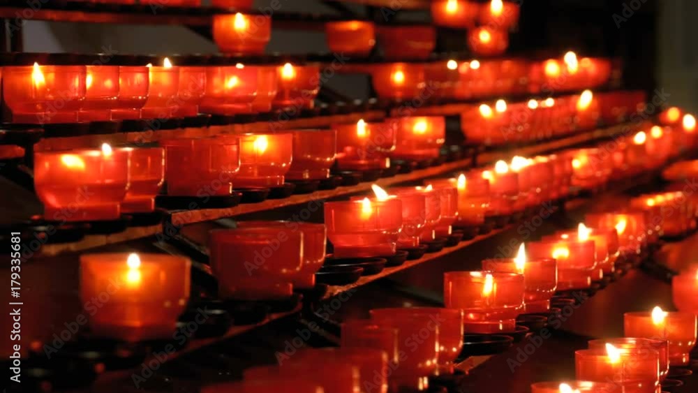 Many burning candles in christian church.Many Candles Are Lit in the ...