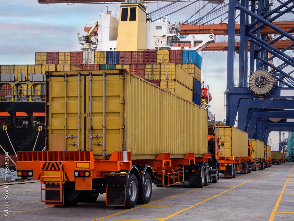 The container vessel during loading at an industrial port and move ...