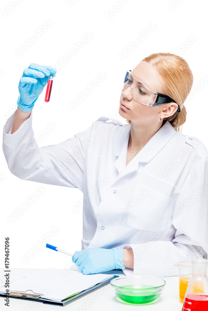 Beautiful female lab assistant with test tubes posing on white ...