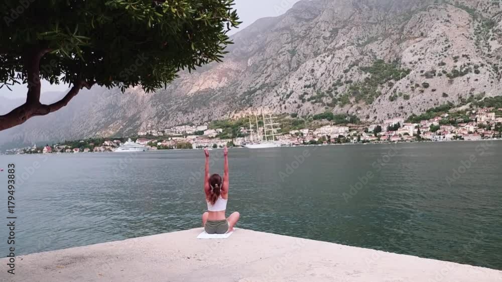 Beautiful yoga with amazing view of sea on background, pretty healthy ...