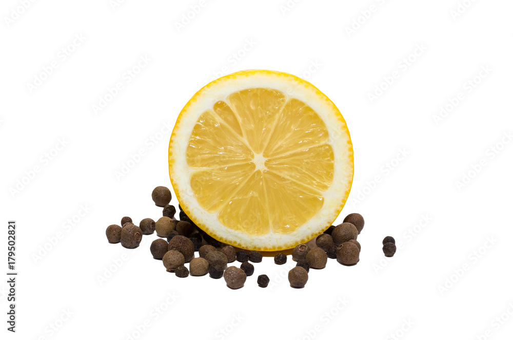 Lemon and black pepper. One whole lemon and its half and black pepper ...