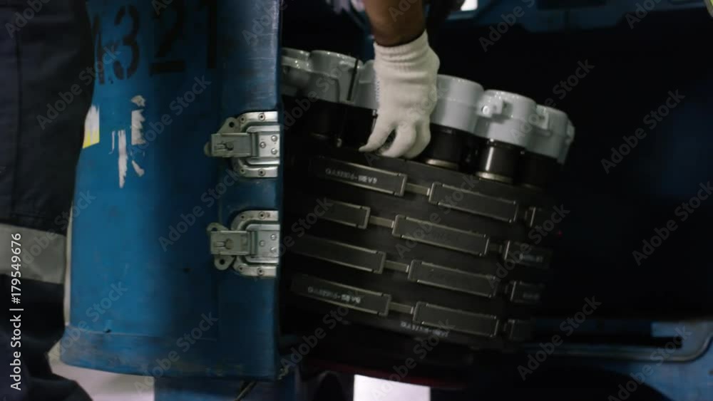 Vidéo Stock Calm workers controlling aircraft machine and chassis ...