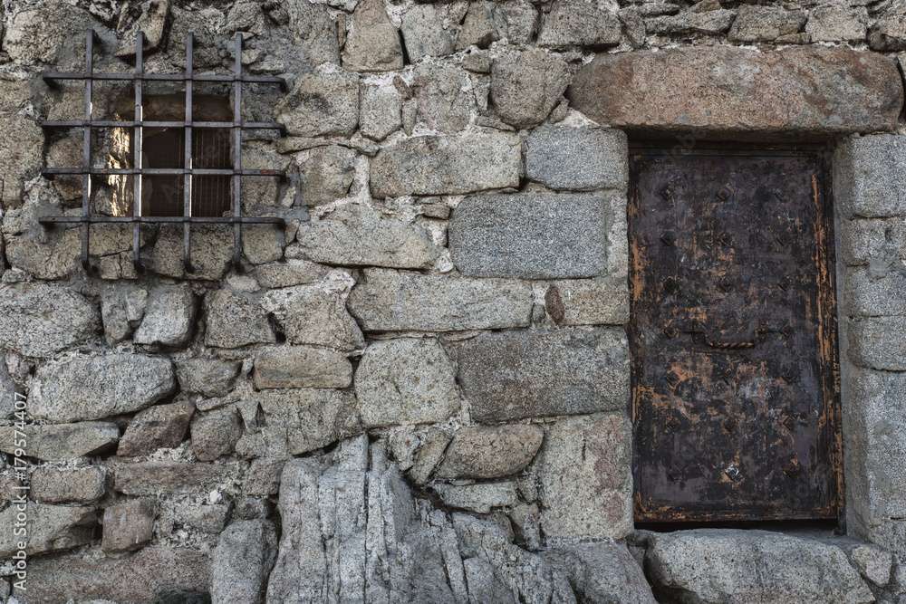 Old wall and the front door in the medieval castle Stock Photo | Adobe ...