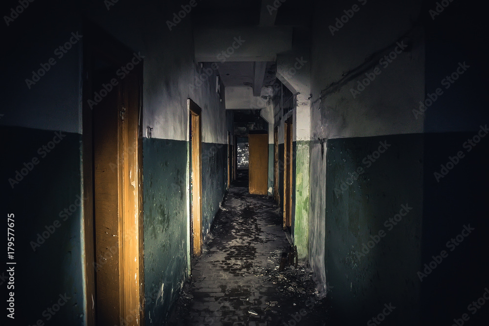 Walkway in creepy abandoned building, dark scary corridor with many ...