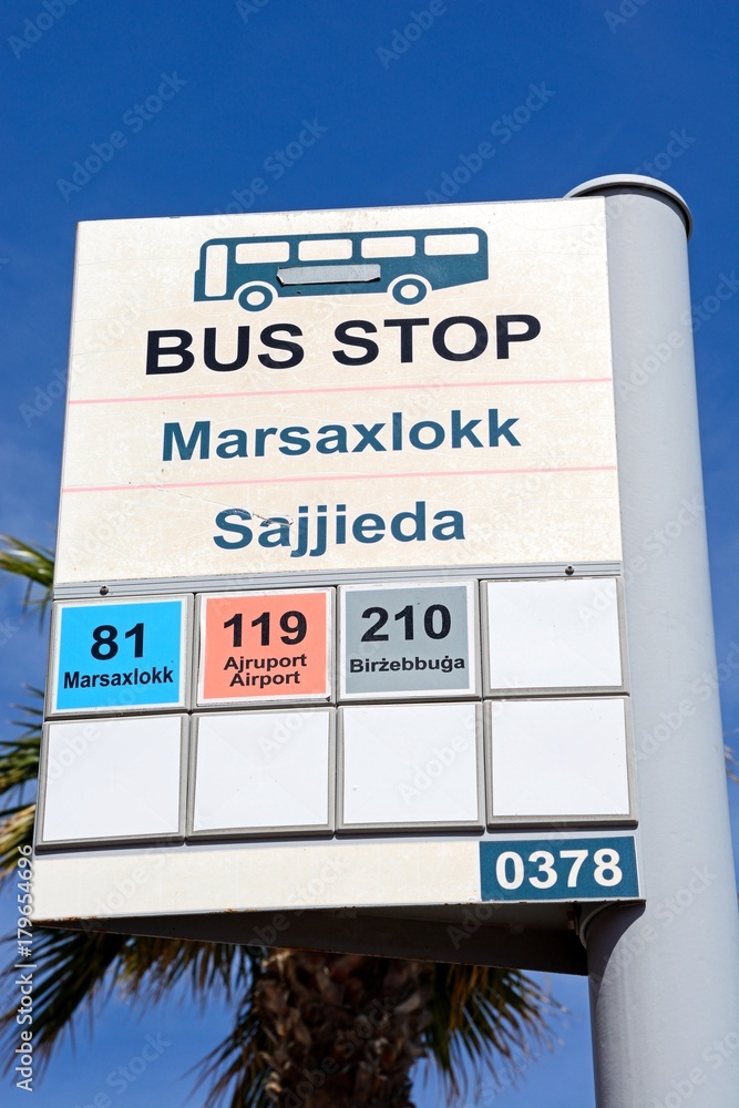 Bus stop sign showing destinations and bus numbers, Marsaxlokk, Malta ...