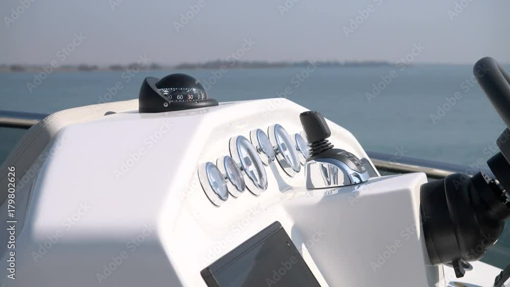 Detail of analogical and digital instruments on the cockpit of a yacht ...