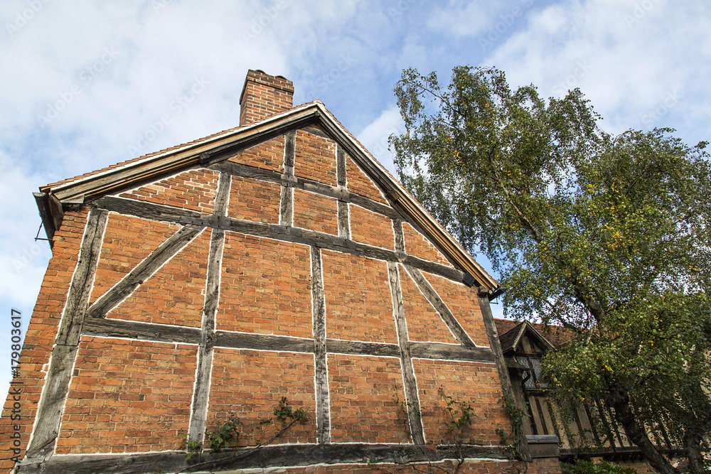 Gable end wall of a traditionally built Elizabethan half timbered, red ...