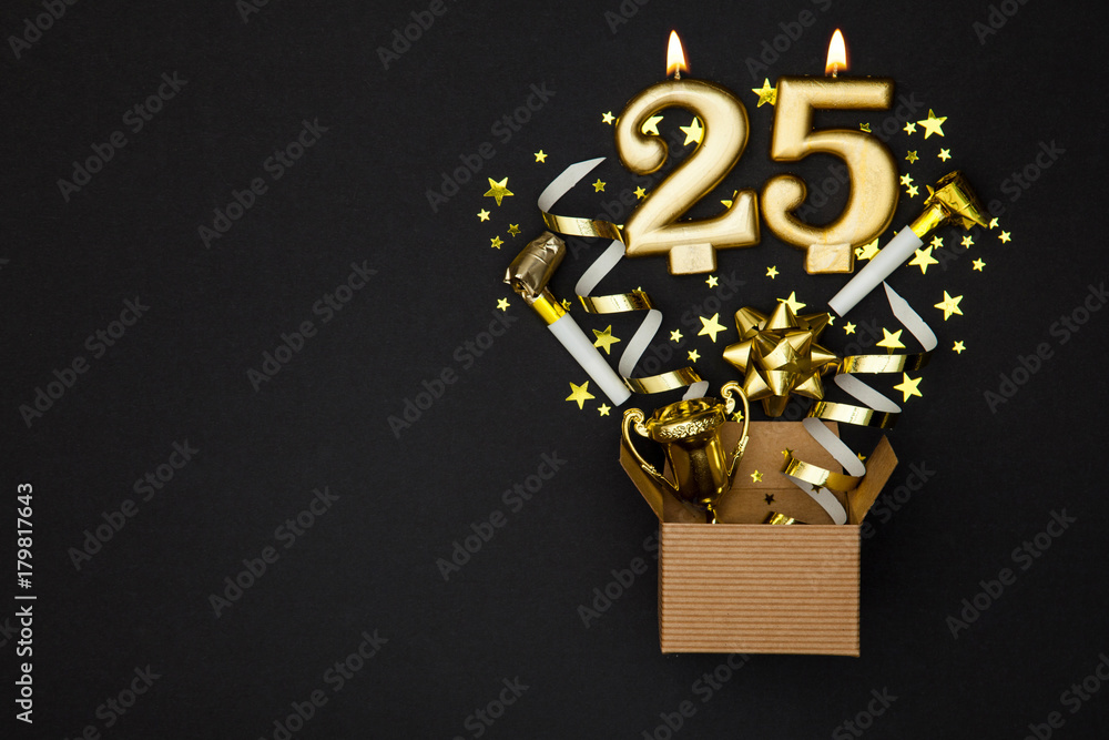Number 25 gold celebration candle and gift box background Stock Photo ...