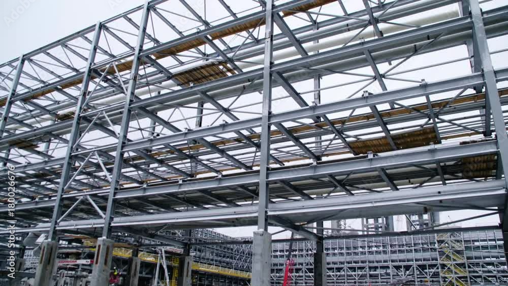 Scaffolding installation at a tank with process structures of refinery ...
