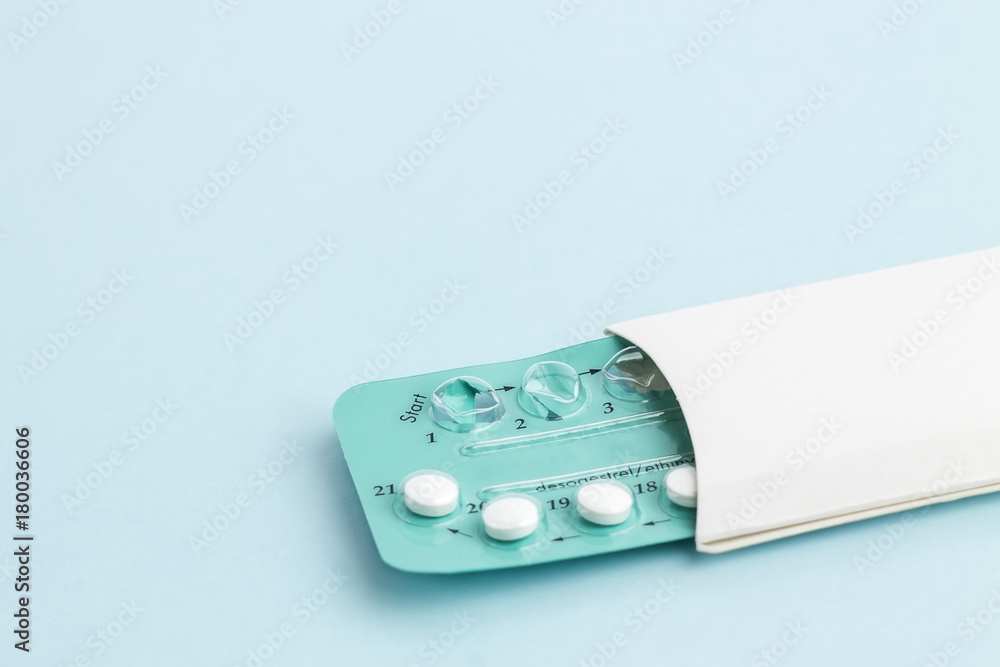 Contraception pills on blue background. Birth control Stock-Foto ...