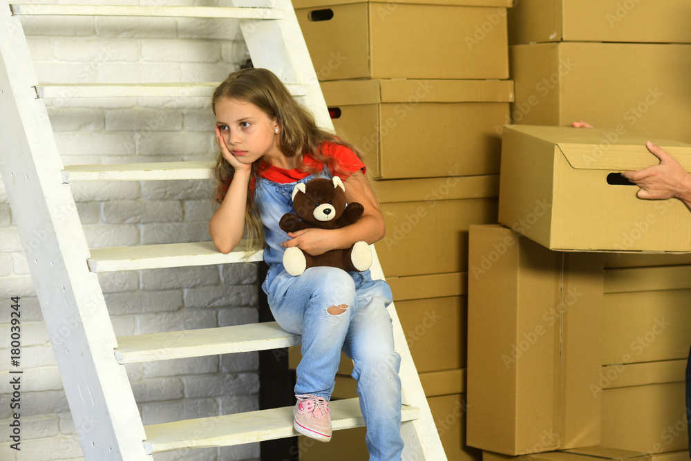 Girl with sad face in room on white wall background Stock Photo | Adobe ...