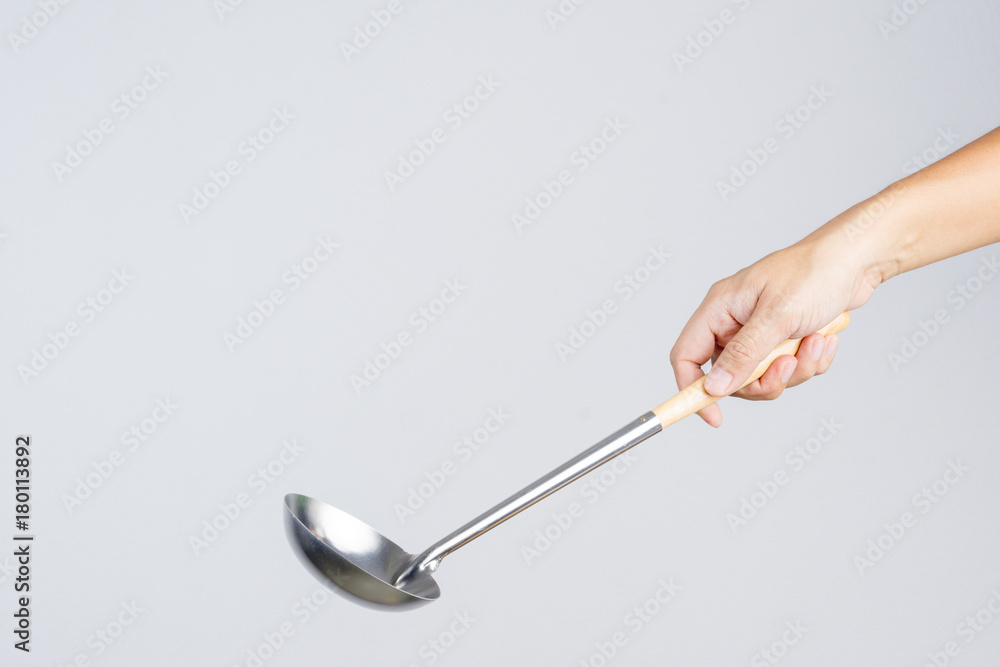 Holding Soup Ladle