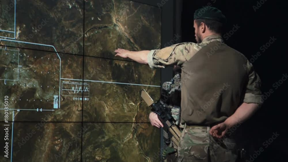 Military men in system control area watching nuclear missile launch ...