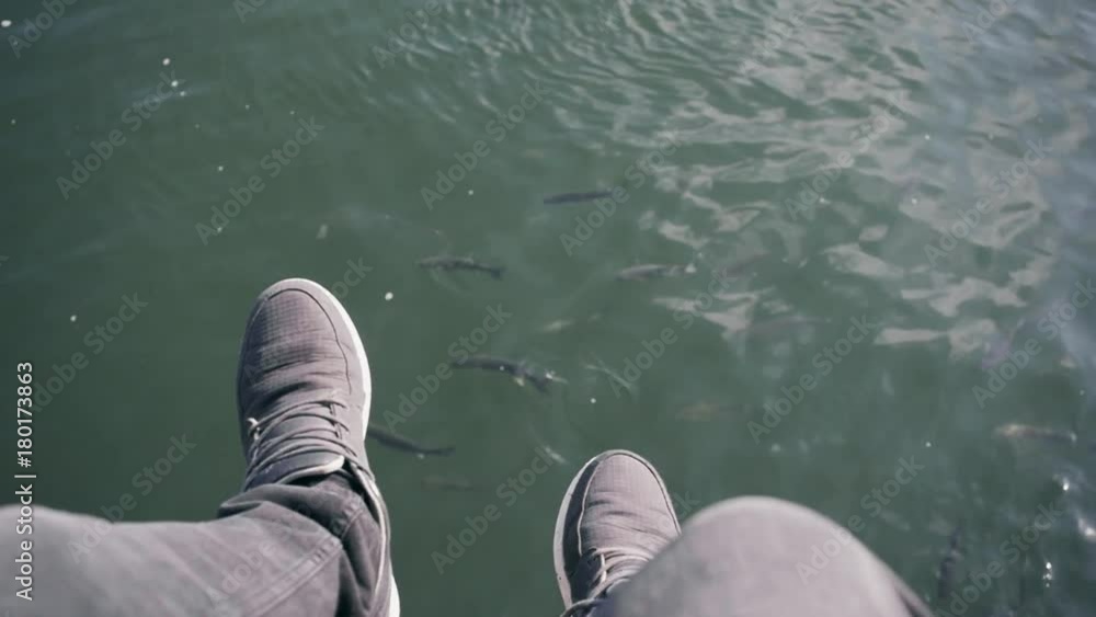 Perspective of a pair of smart shoes sneaker being worn by a man ...
