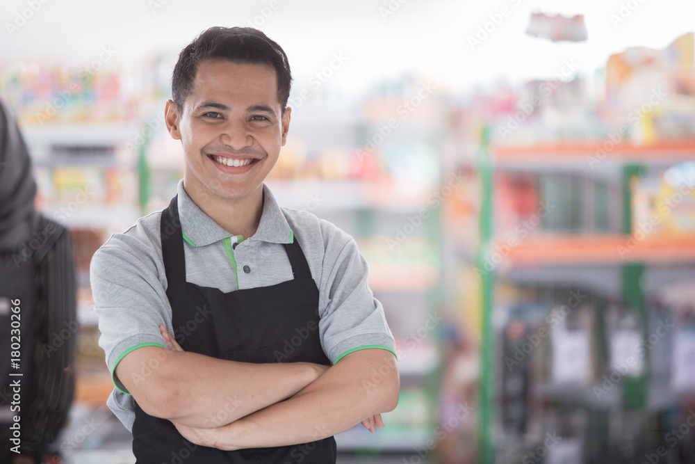 happy asian male shopkeeper Stock Photo | Adobe Stock