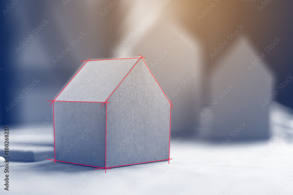 house concept with house paper model with drawing tools on brown ...