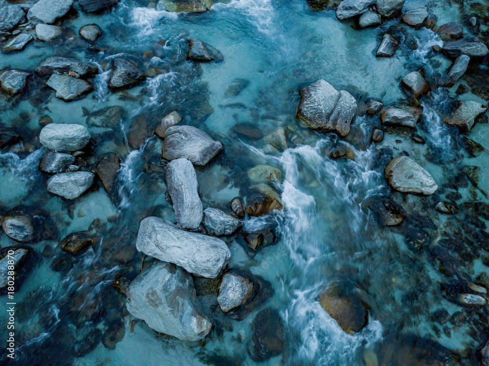 Aerial view of river flowing between rocks, close up Stock Photo ...