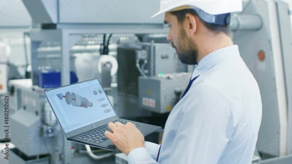 Engineer Working on a Personal Computer with Green Screen Mock-up ...
