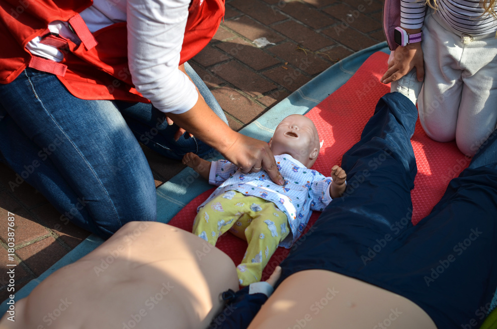 first aid lesson for a child Stock Photo | Adobe Stock