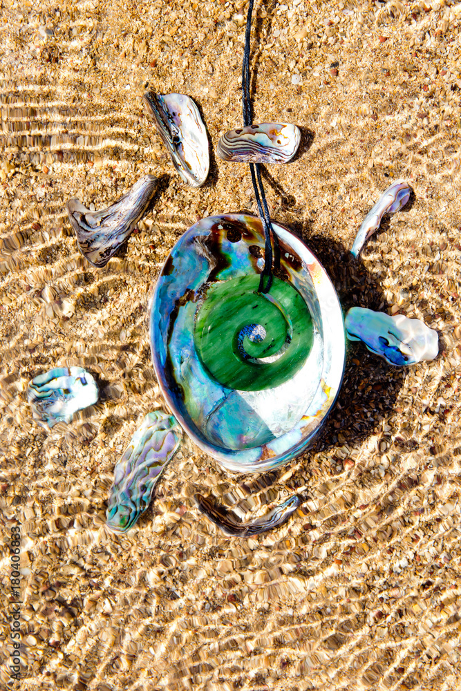 New Zealand - Maori theme - Jade pounamu Koru with Paua shell Stock ...