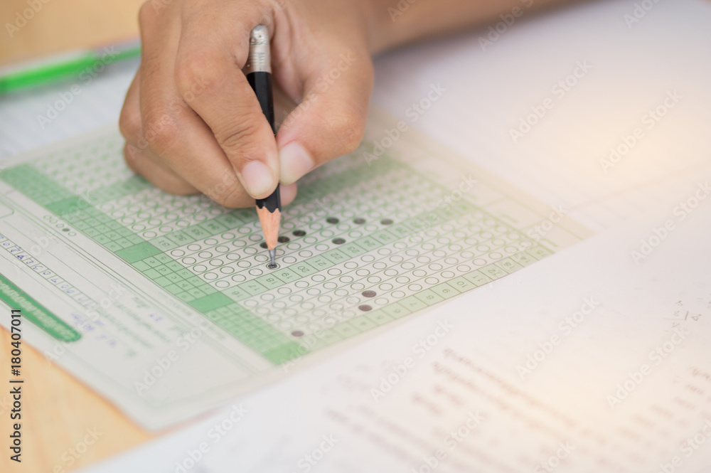 students hand testing doing examination with pencil drawing selected ...