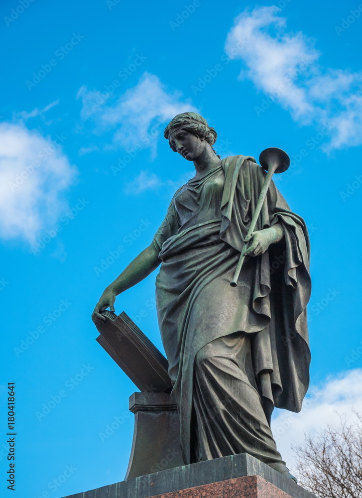 The sculpture depicts the muse of Clio's history with book and trumpet in his hands Stock Photo ...