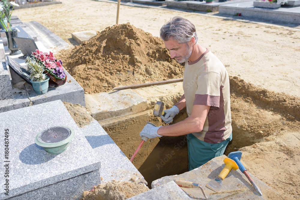 digging a grave Stock Photo | Adobe Stock