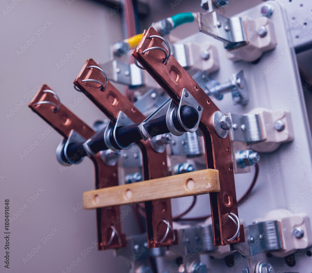 Wires and switches in electric box. Electrical panel with fuses and ...