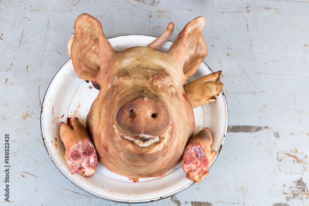 pig's head,feet and tail on tray Stock Photo | Adobe Stock