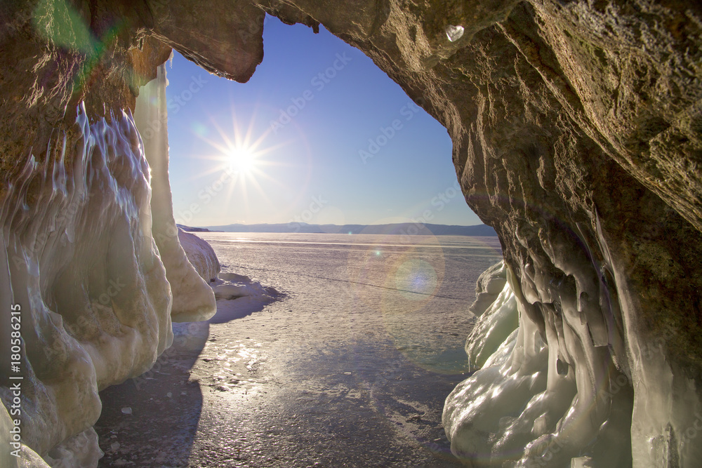 The view from the grotto with icicles, chunks of ice and hummocks to ...