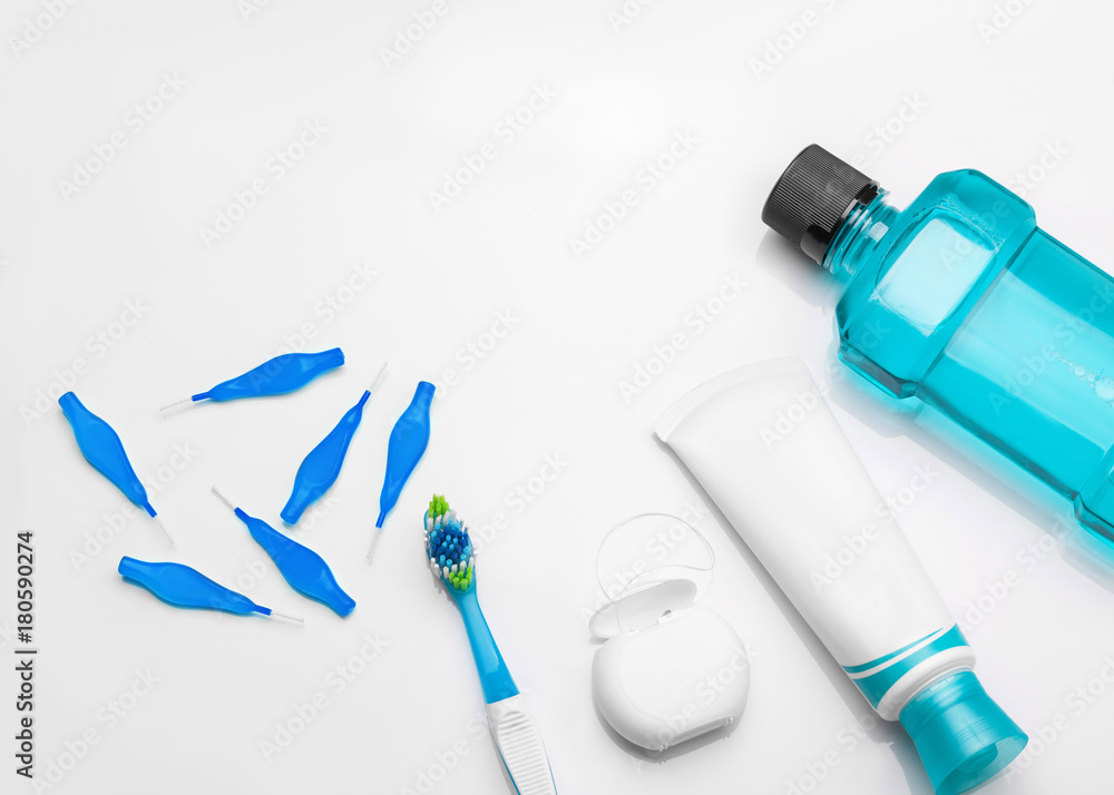 Tools for dental care: orthodontic brush, floss, toothpaste. Invisible ...