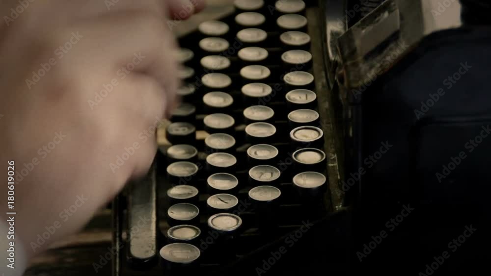 Writing machine and hands typing text. Retro stylized film in vintage ...