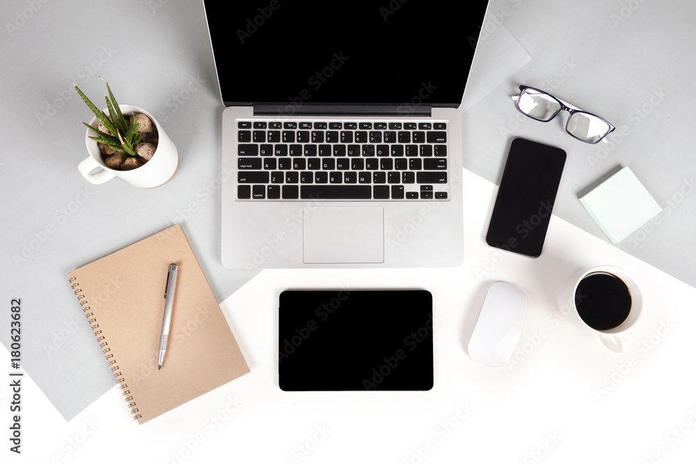 Flat lay photo of Office table with laptop computer, notebook, digital ...