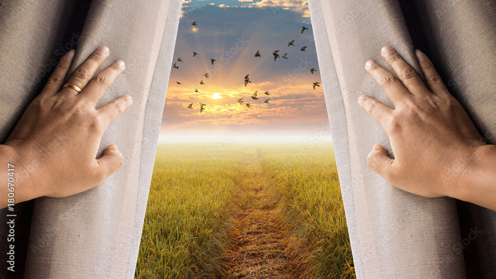 man and hope concept . man opening window curtains and seeing the city ...